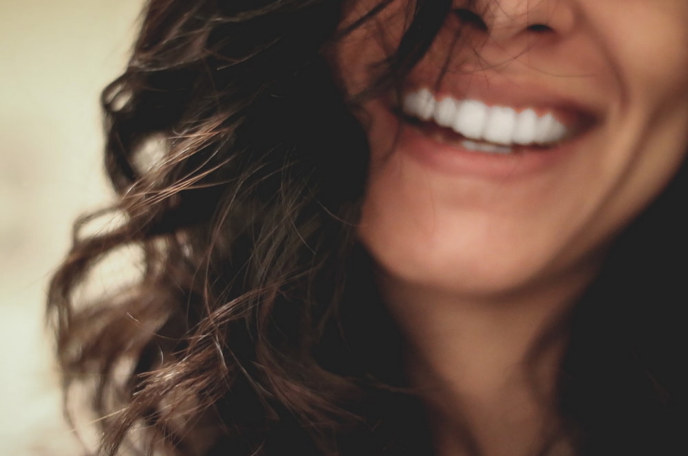 Dental Bonding vs. Veneers: Cost, Durability, and More — Elizabeth L ...